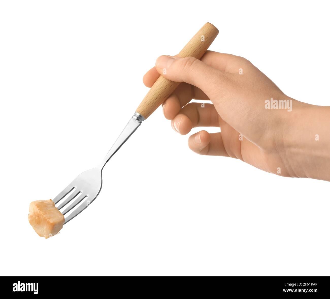 Female hand and fork with fried chicken piece on white background Stock ...