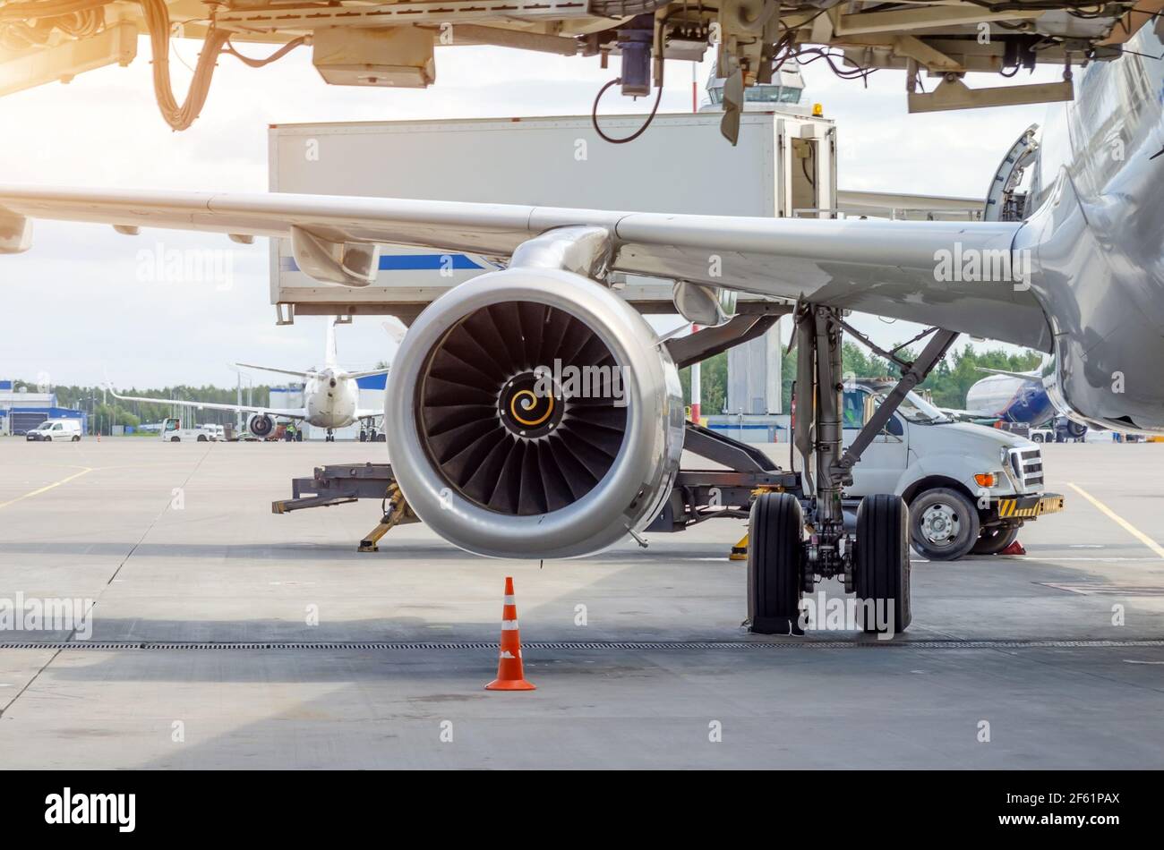 Jet aircraft wing view with engine and landing gear Stock Photo - Alamy