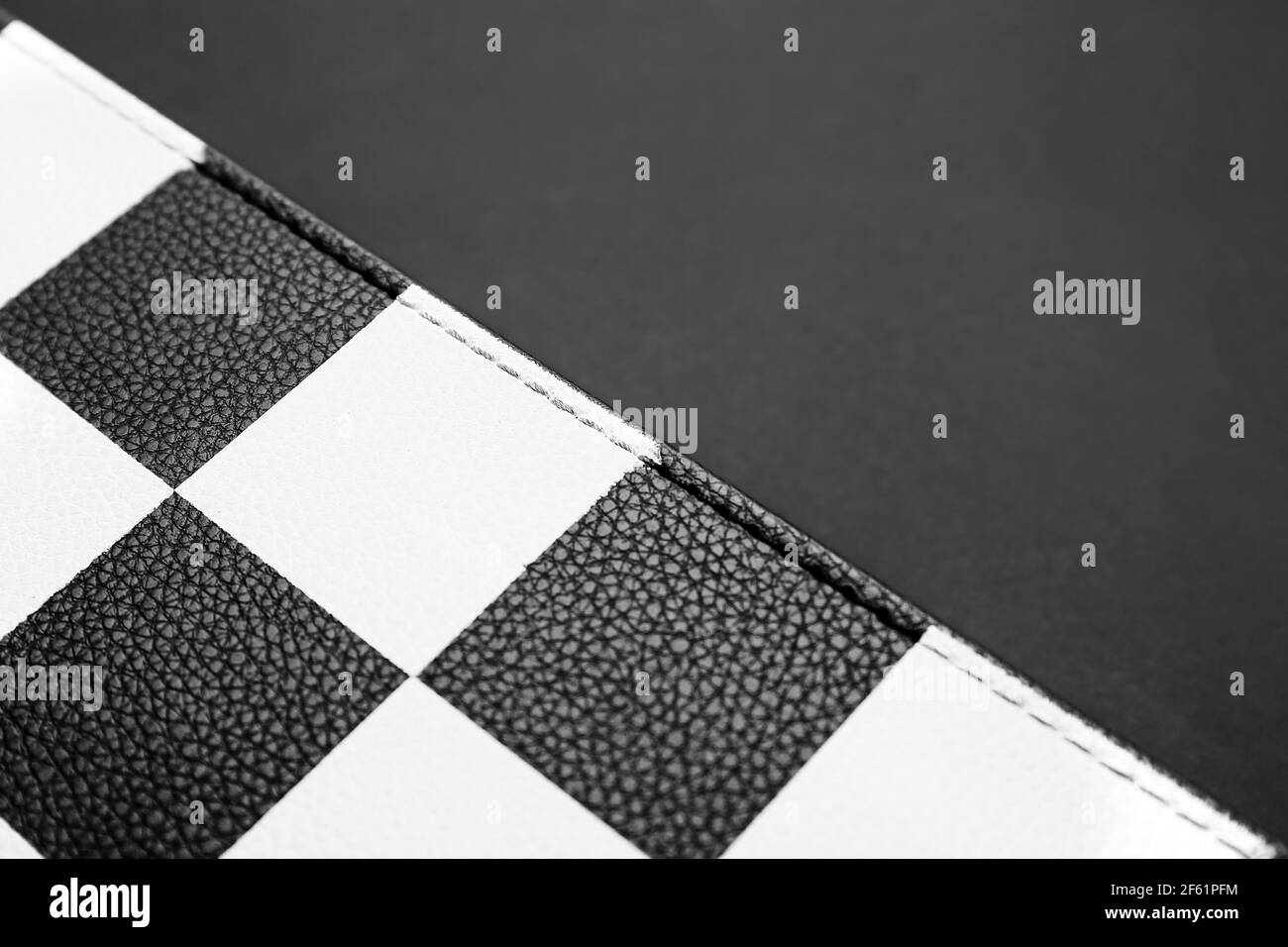 Checkered leather texture on dark background, closeup Stock Photo - Alamy