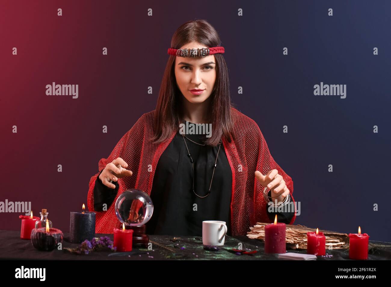 Female fortune teller reading future Stock Photo - Alamy