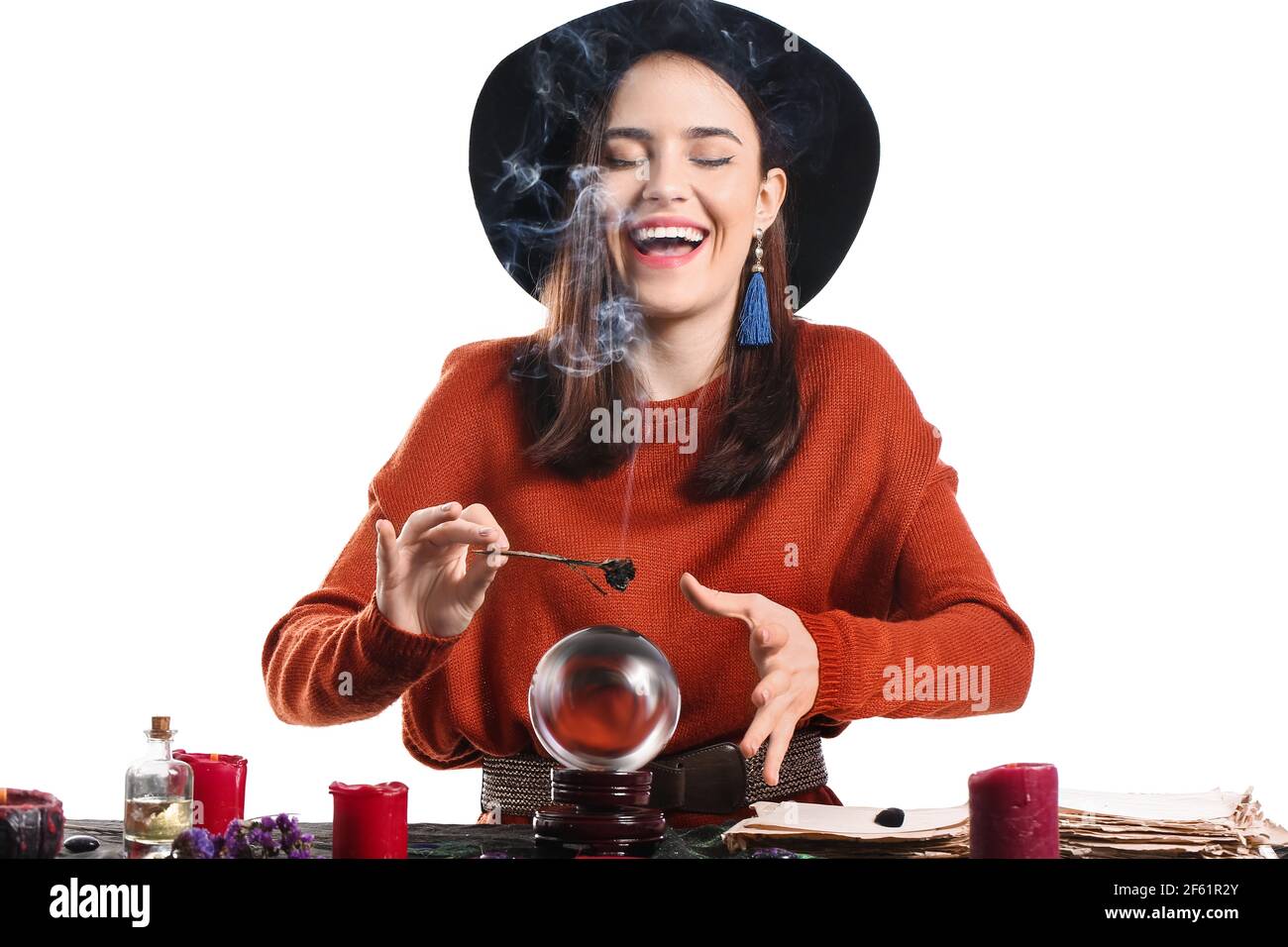 Female fortune teller on white background Stock Photo - Alamy