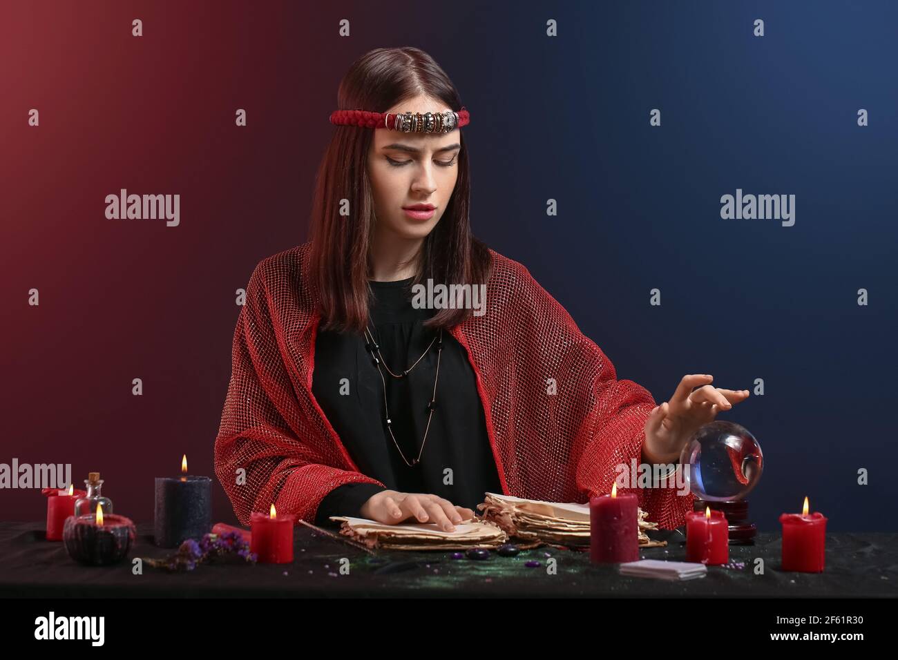 Female fortune teller reading future Stock Photo - Alamy