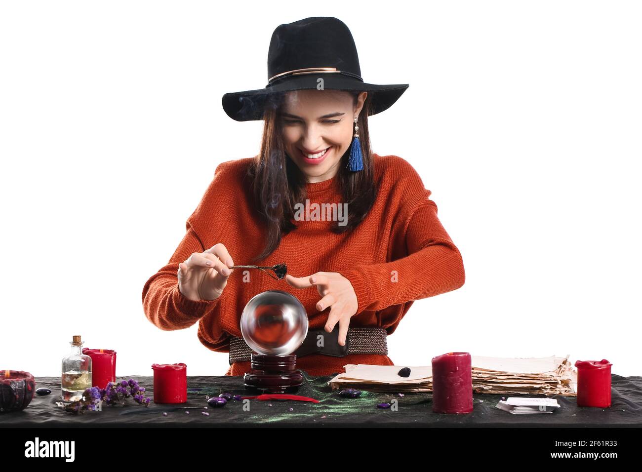 Female fortune teller on white background Stock Photo - Alamy
