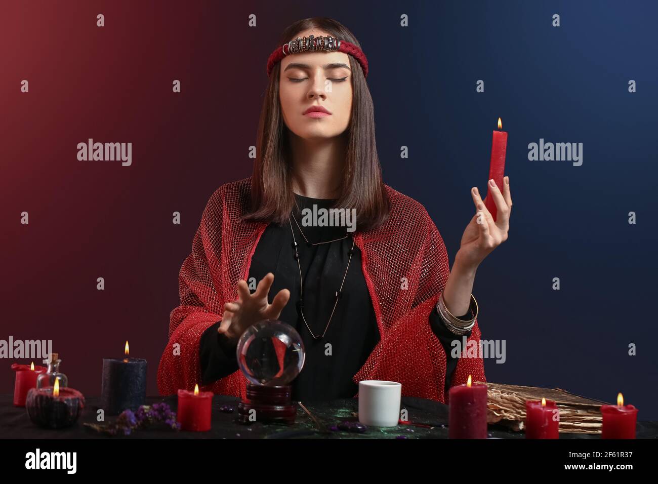 Female fortune teller reading future Stock Photo - Alamy