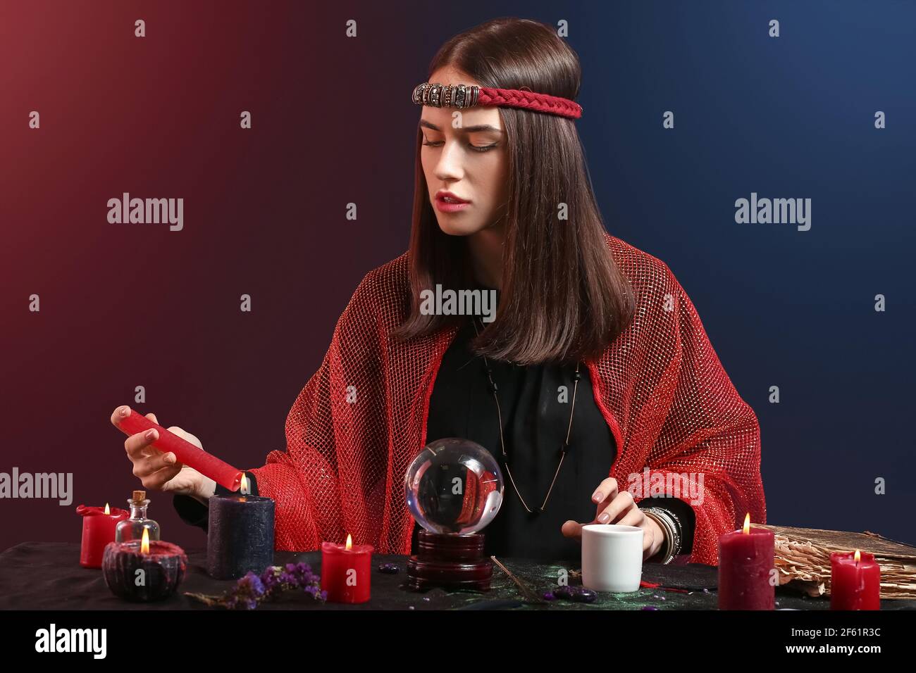 Female fortune teller reading future Stock Photo - Alamy