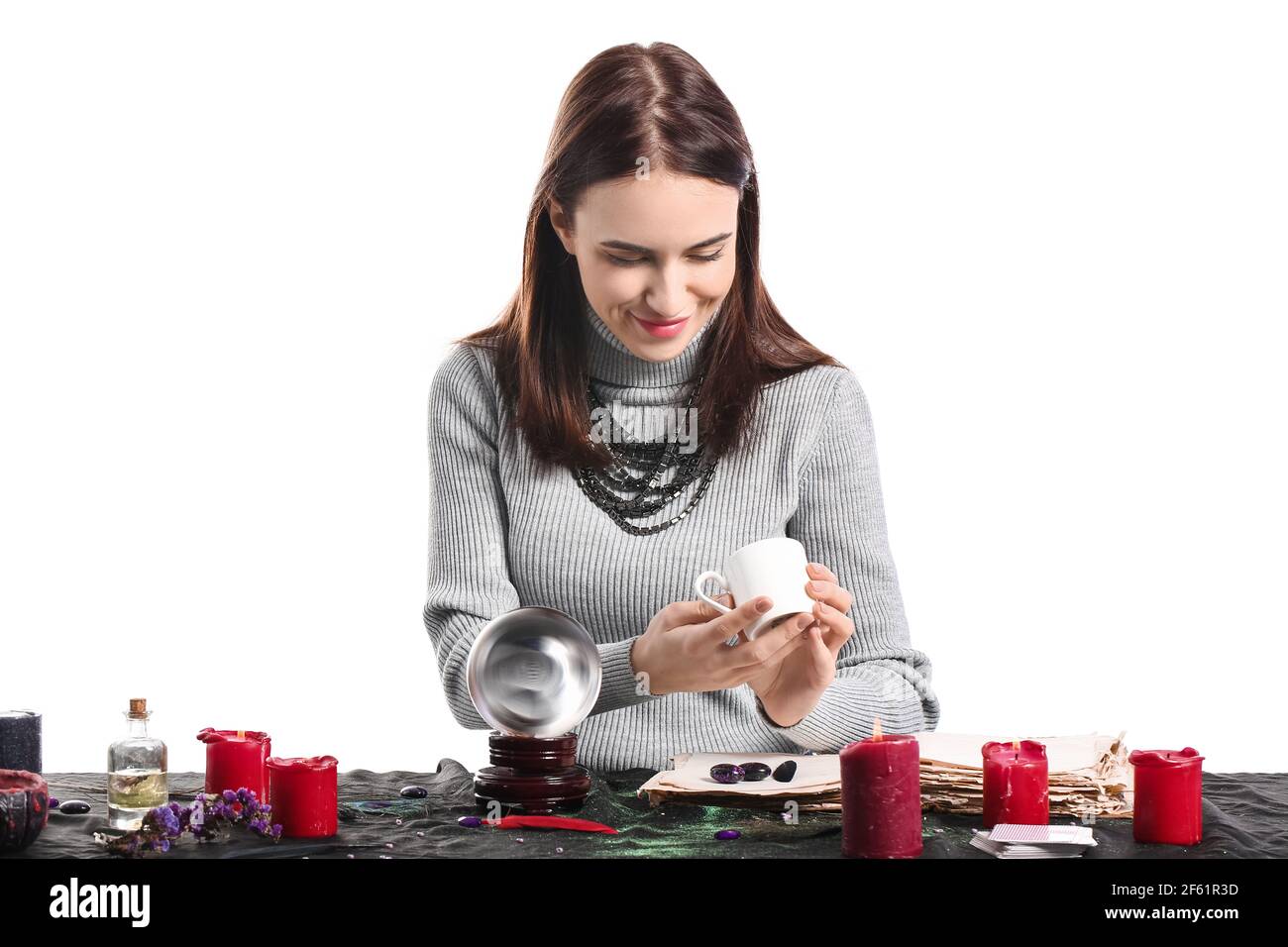 Female fortune teller on white background Stock Photo - Alamy