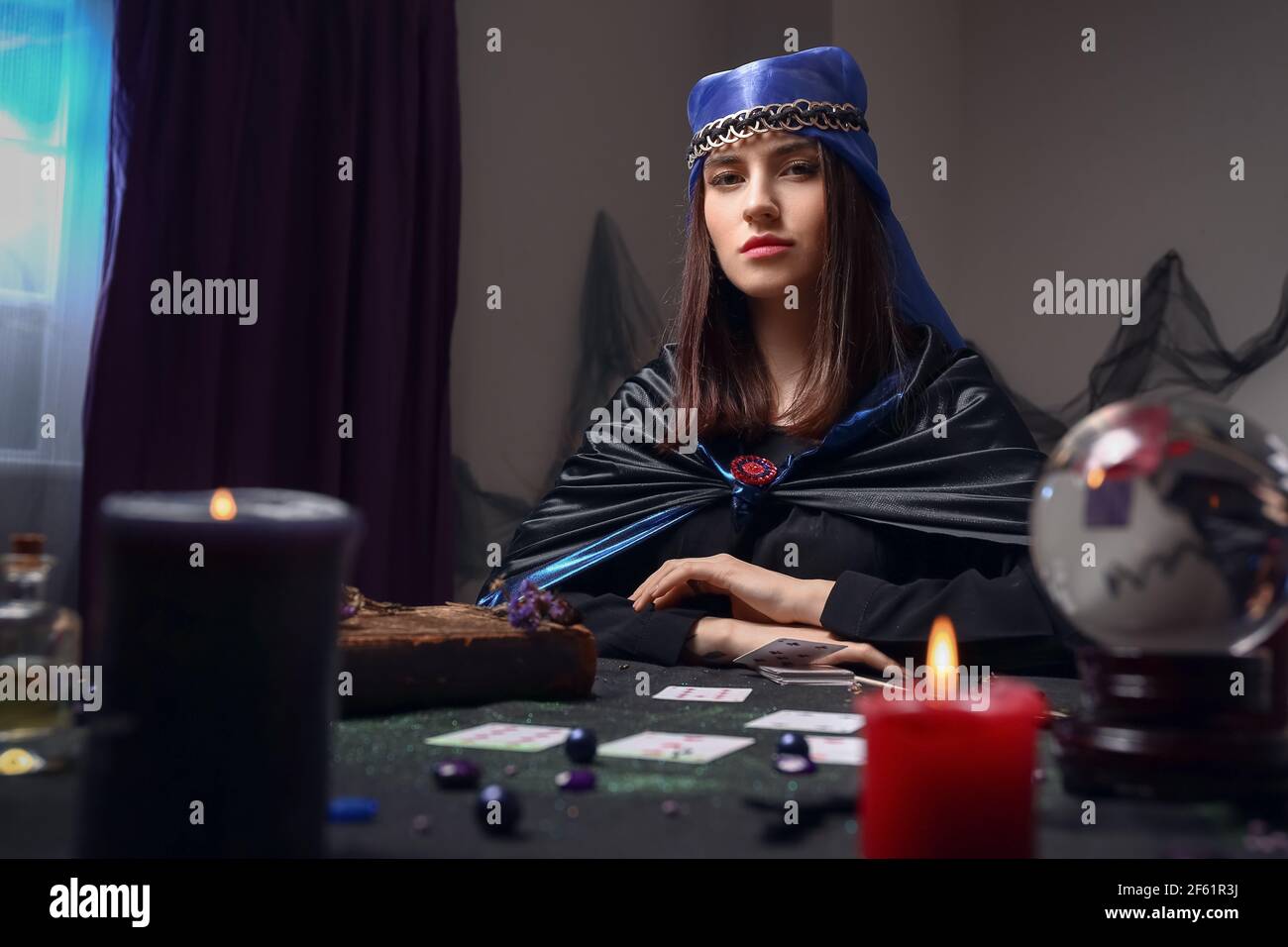 Female fortune teller reading future Stock Photo - Alamy