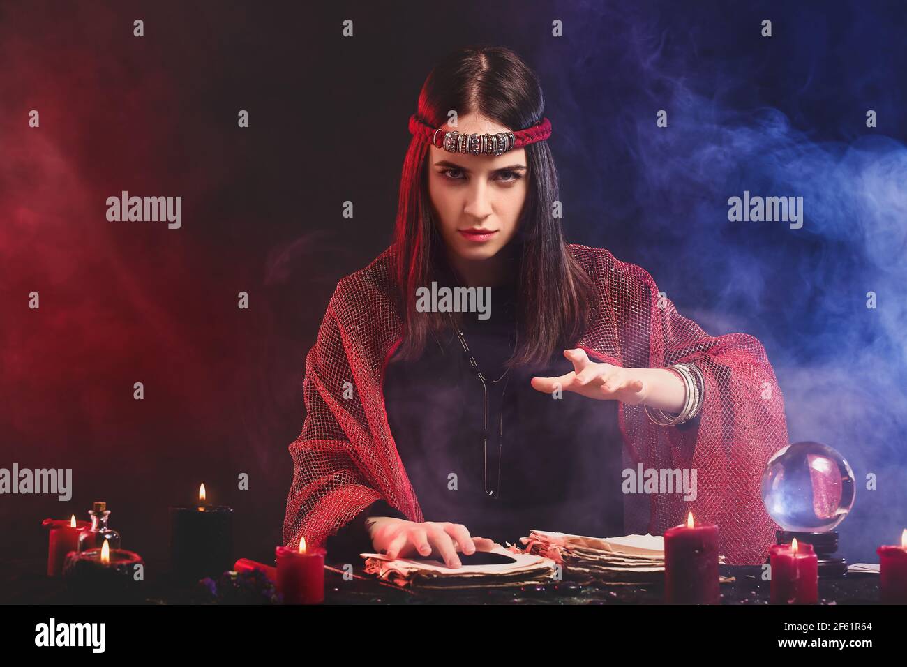 Female fortune teller reading future Stock Photo - Alamy