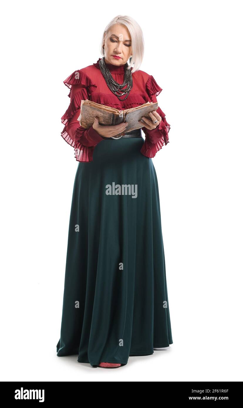 Female fortune teller with book on white background Stock Photo - Alamy