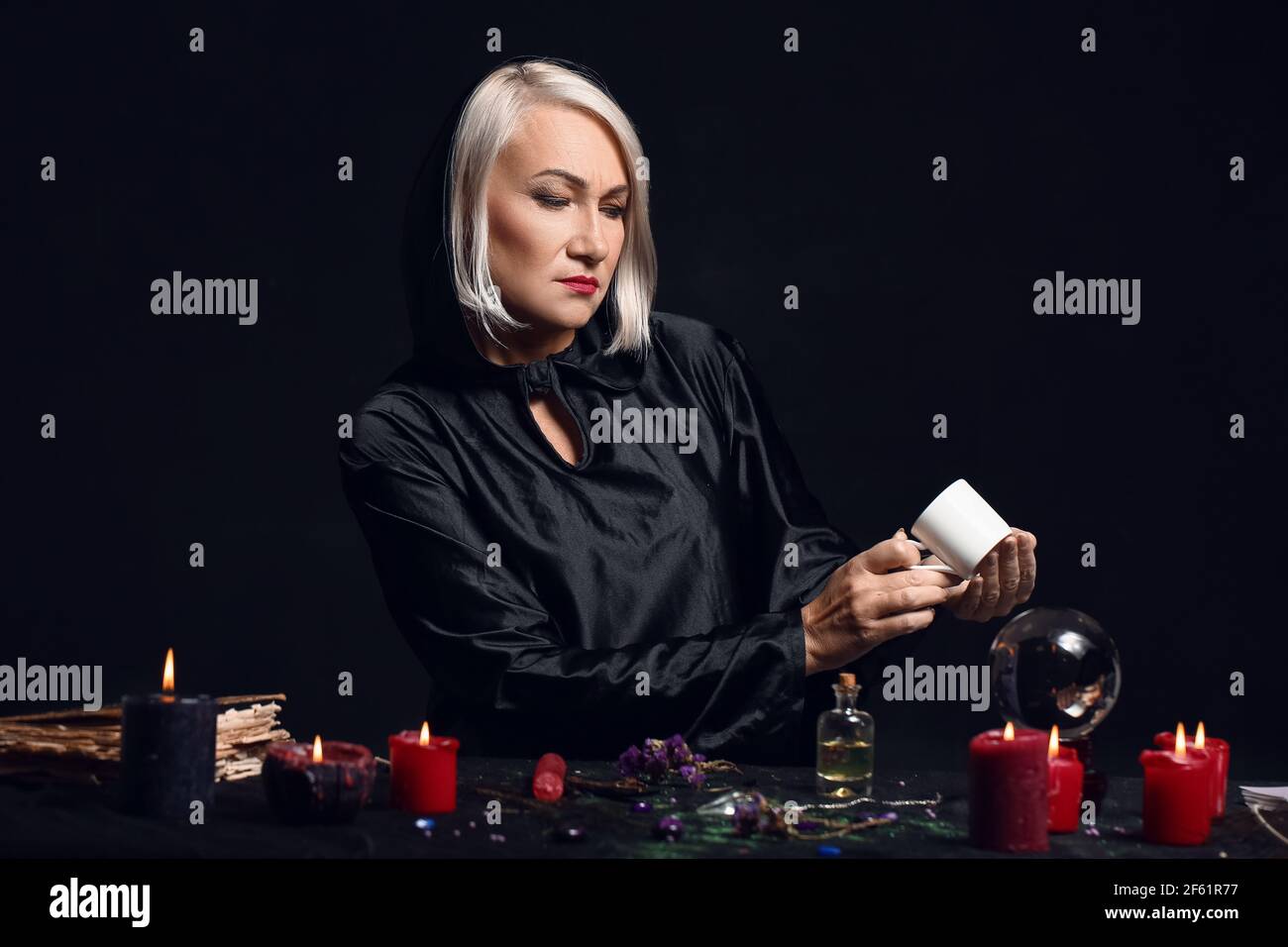 Female fortune teller reading future Stock Photo - Alamy