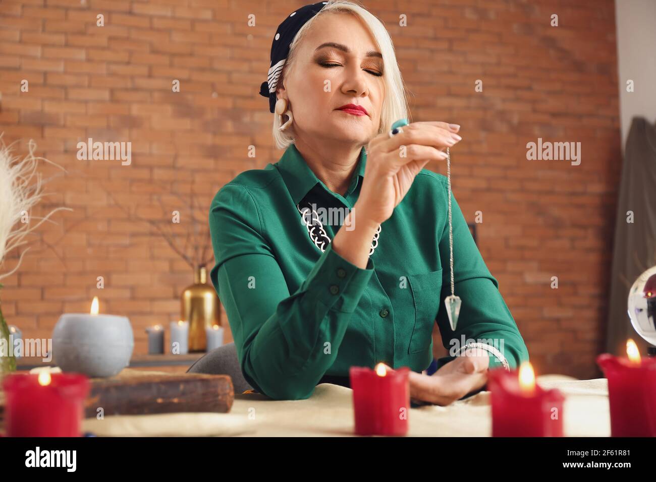 Female fortune teller reading future Stock Photo - Alamy
