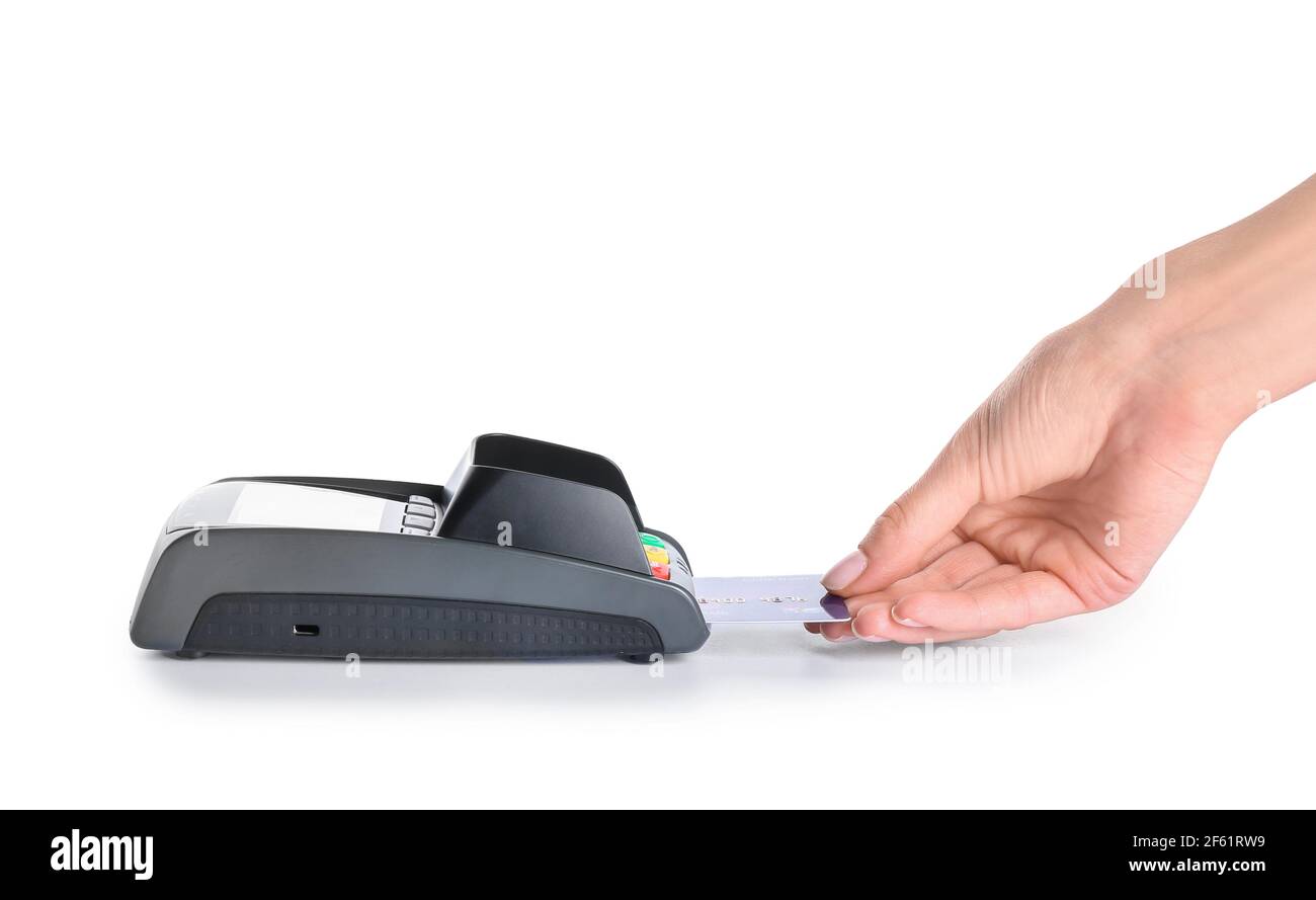 Female hand with credit card and payment terminal on white background ...