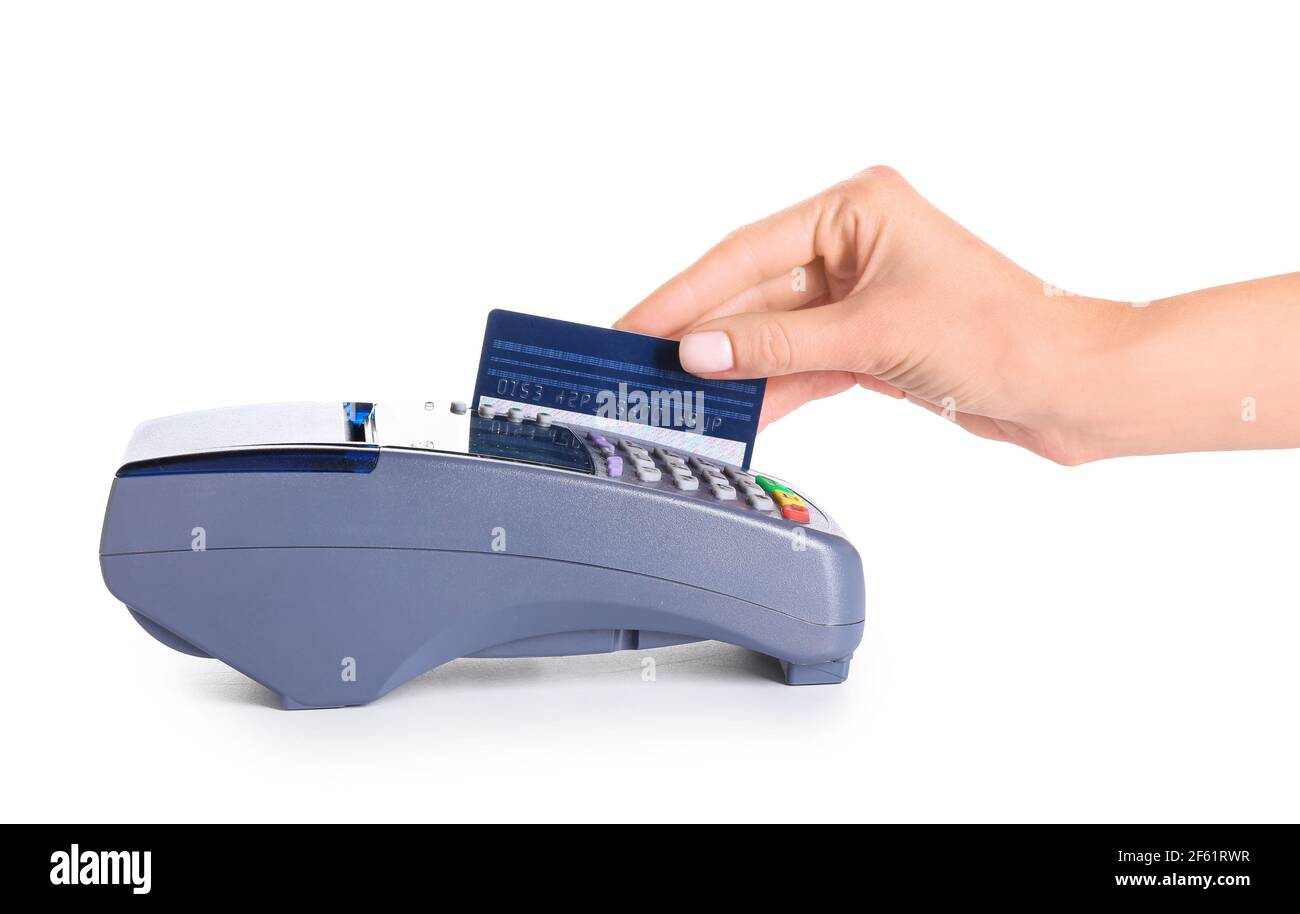 Female hand with credit card and payment terminal on white background ...