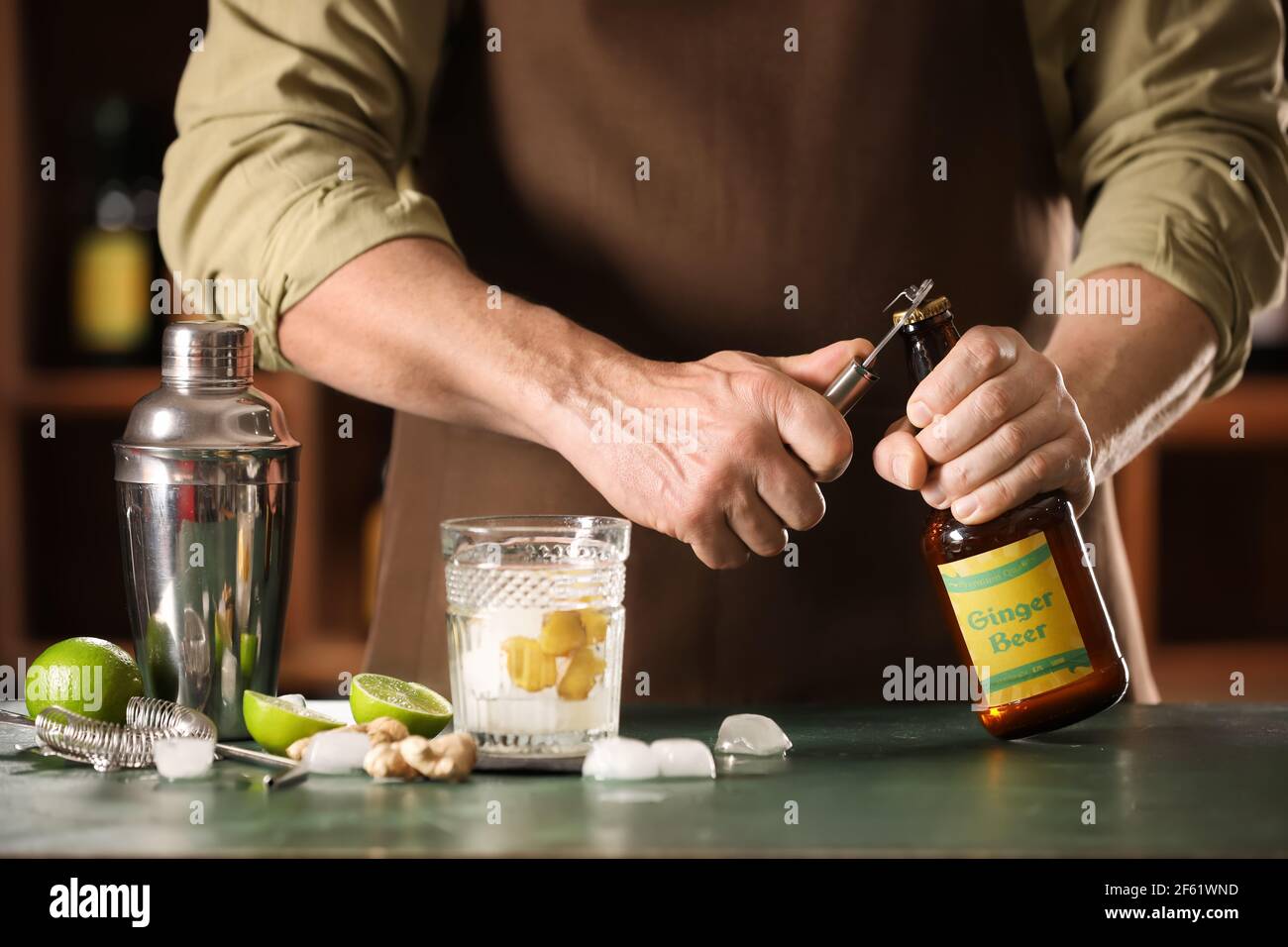 Man opening beer bottle hi-res stock photography and images - Alamy