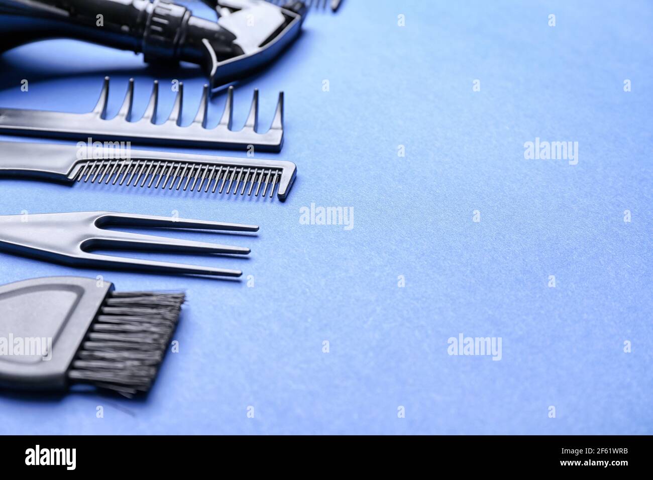 Set of hairdresser's tools on color background, closeup Stock Photo - Alamy
