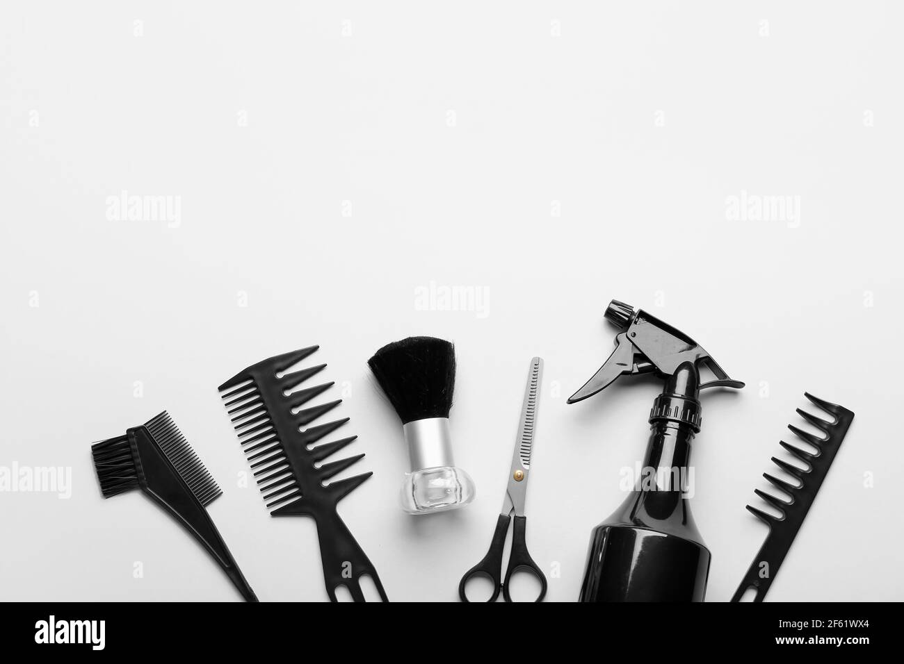 Set of hairdresser's tools on white background Stock Photo - Alamy