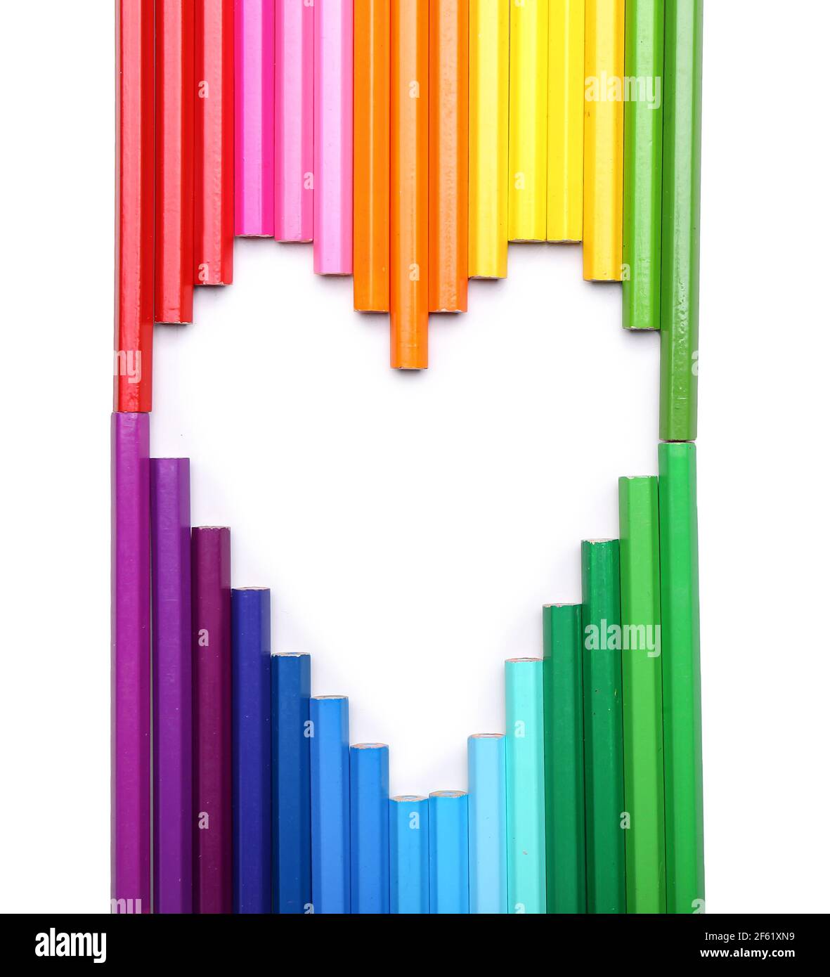 Heart shape made of colorful pencils on white background Stock Photo ...