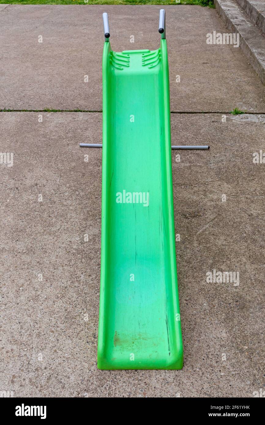 Empty Green Plastic Slide Slope Children Playground Stock Photo - Alamy