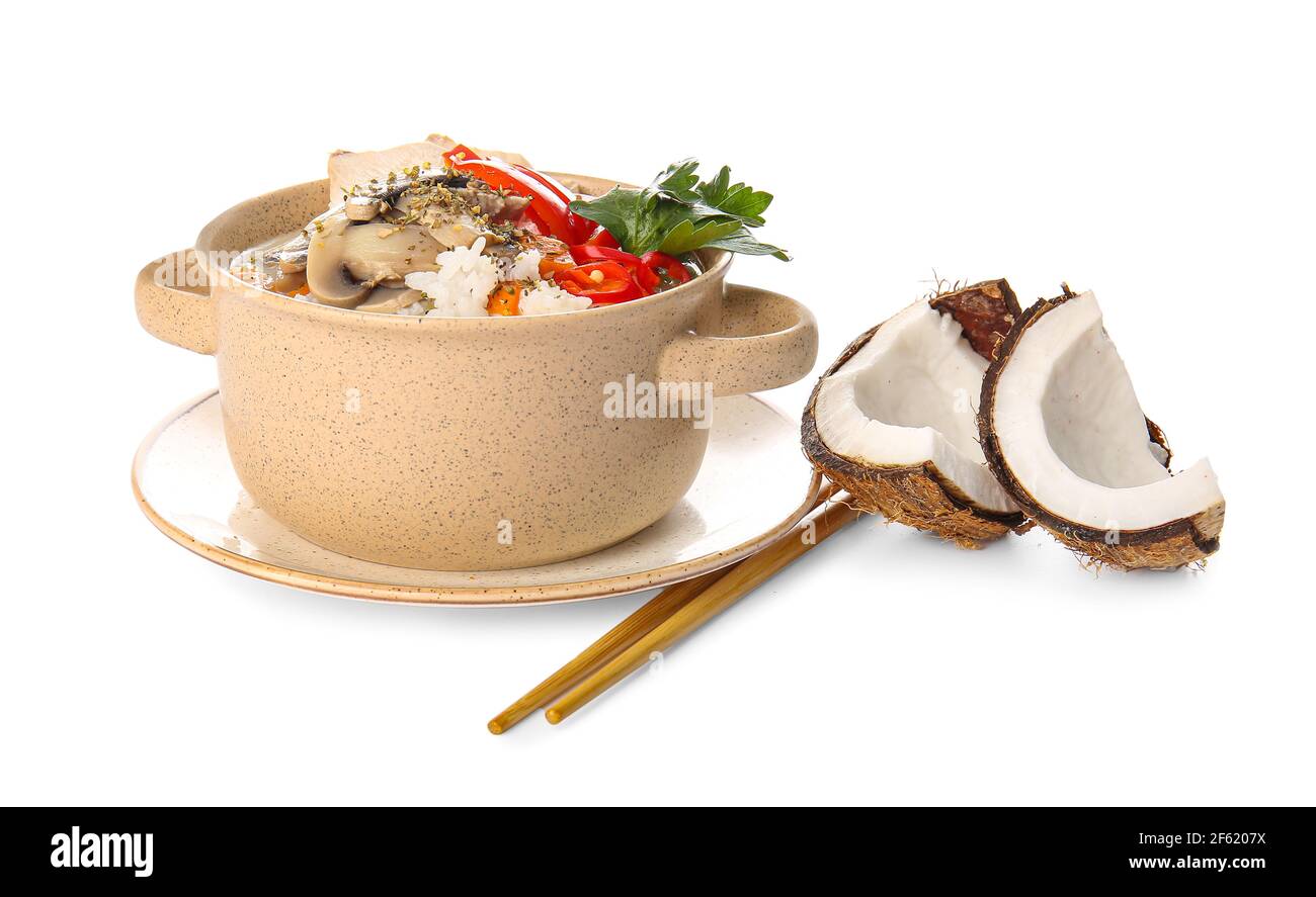 Cooking pot with Thai chicken rice soup on white background Stock Photo ...