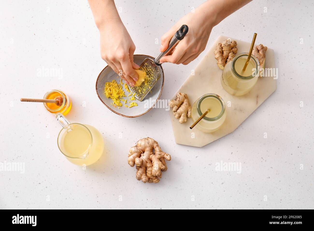 Grating of ginger hi-res stock photography and images - Alamy