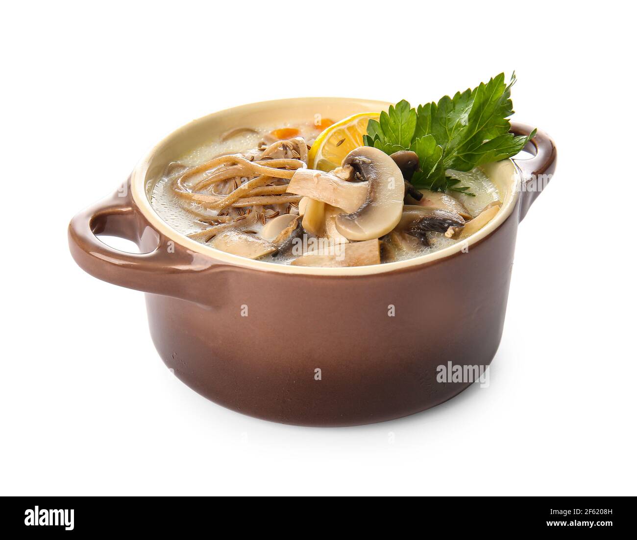 Cooking pot with Thai noodle soup on white background Stock Photo - Alamy