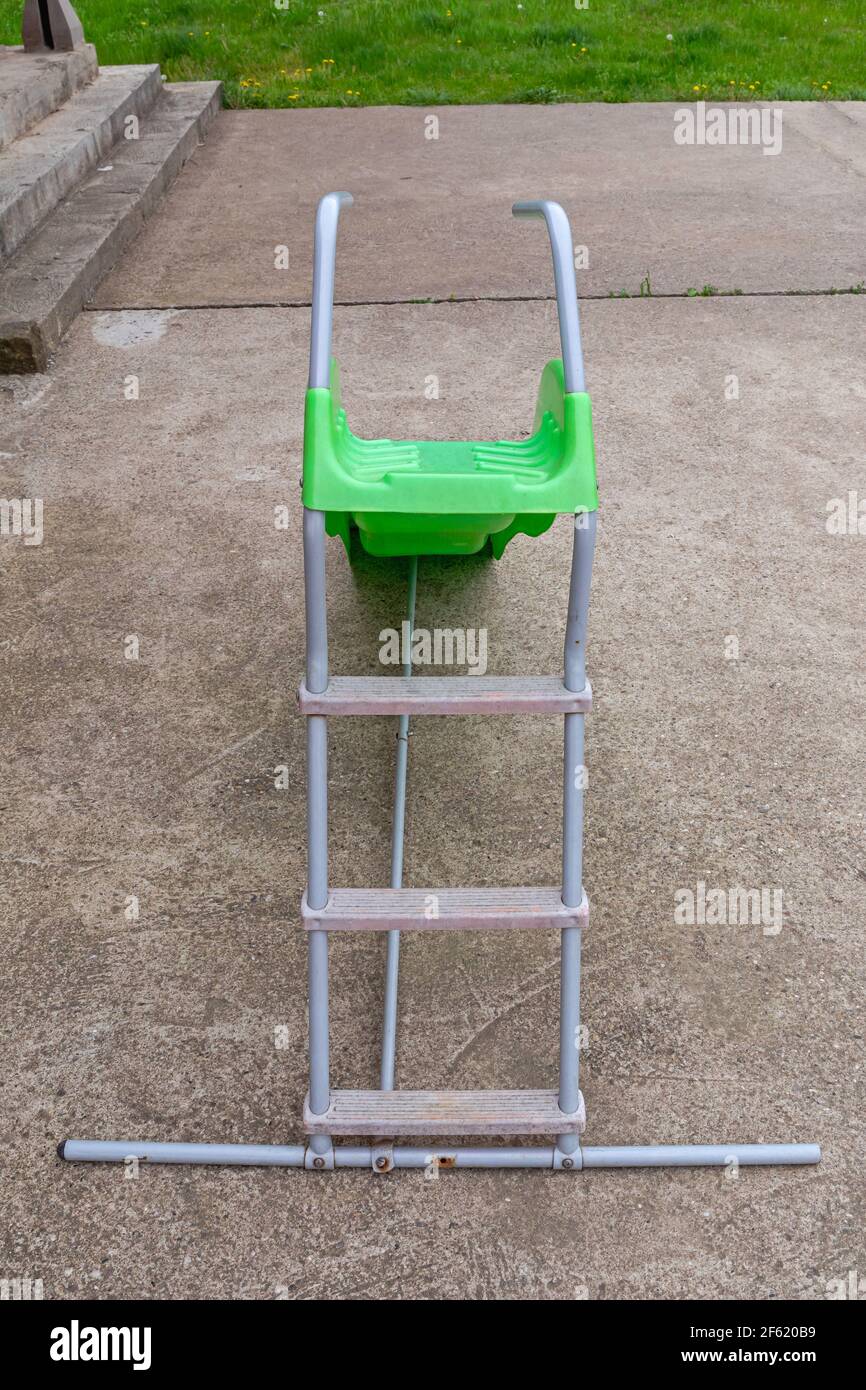 Empty Green Plastic Slide Slope Children Playground Stock Photo - Alamy