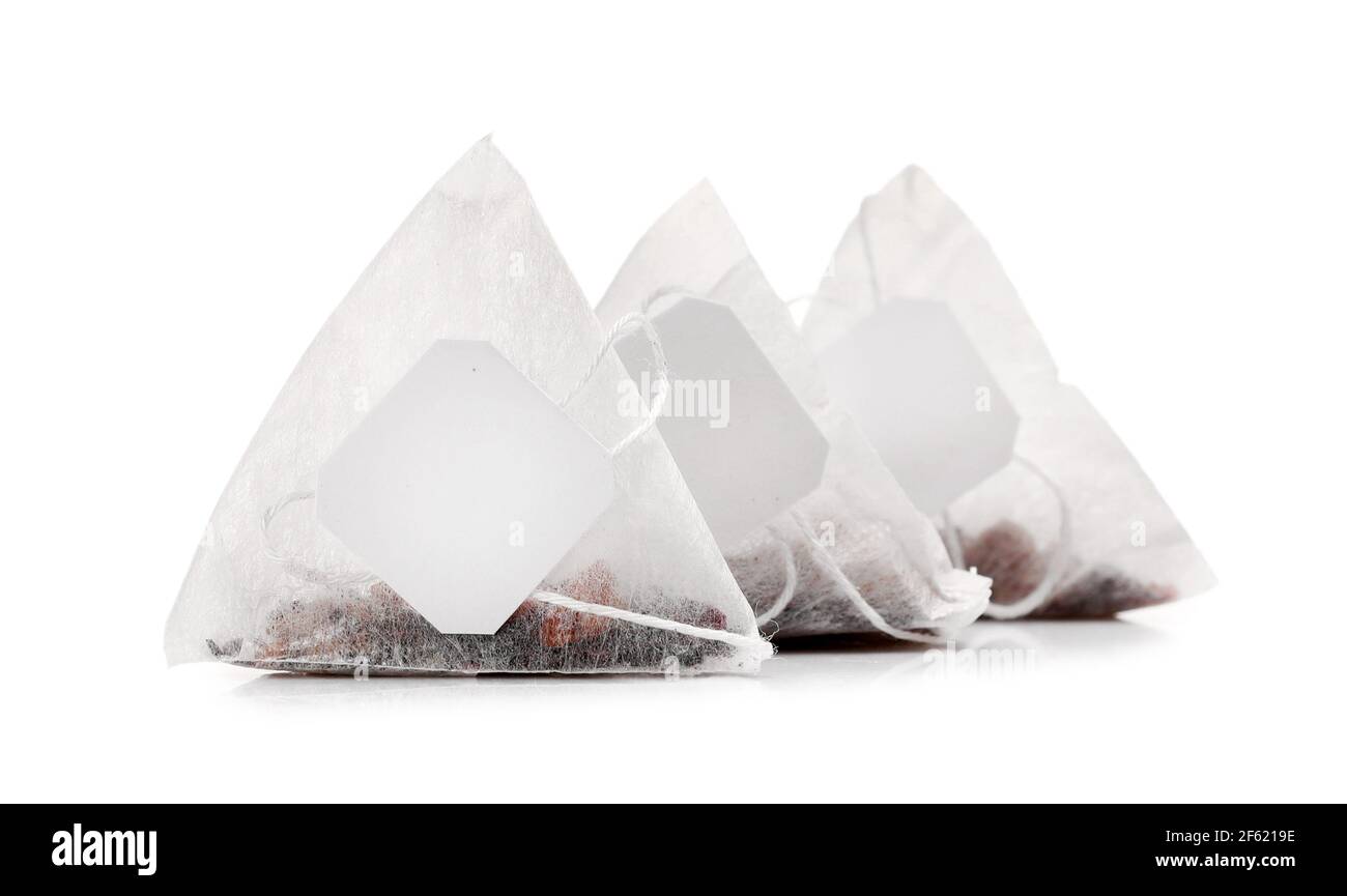 Tea bags on white background Stock Photo - Alamy