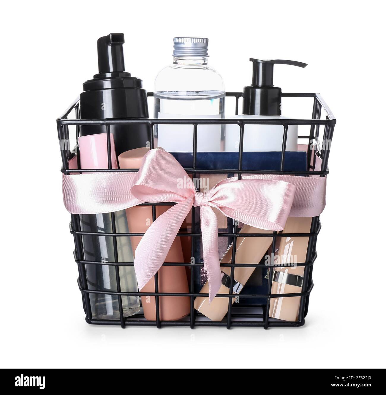 Gift basket with cosmetics on white background Stock Photo - Alamy