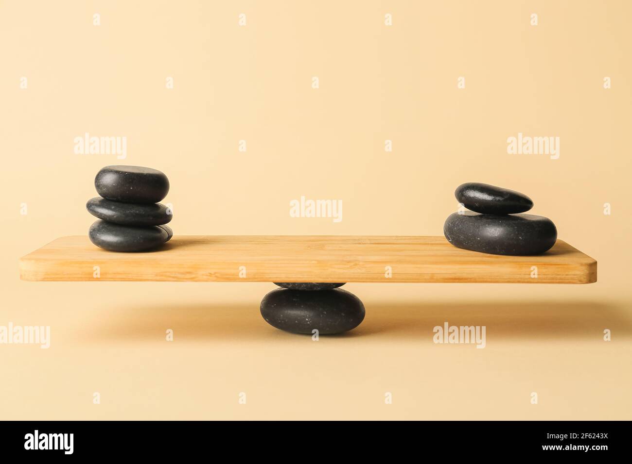 Teetering teeterboard hi-res stock photography and images - Alamy