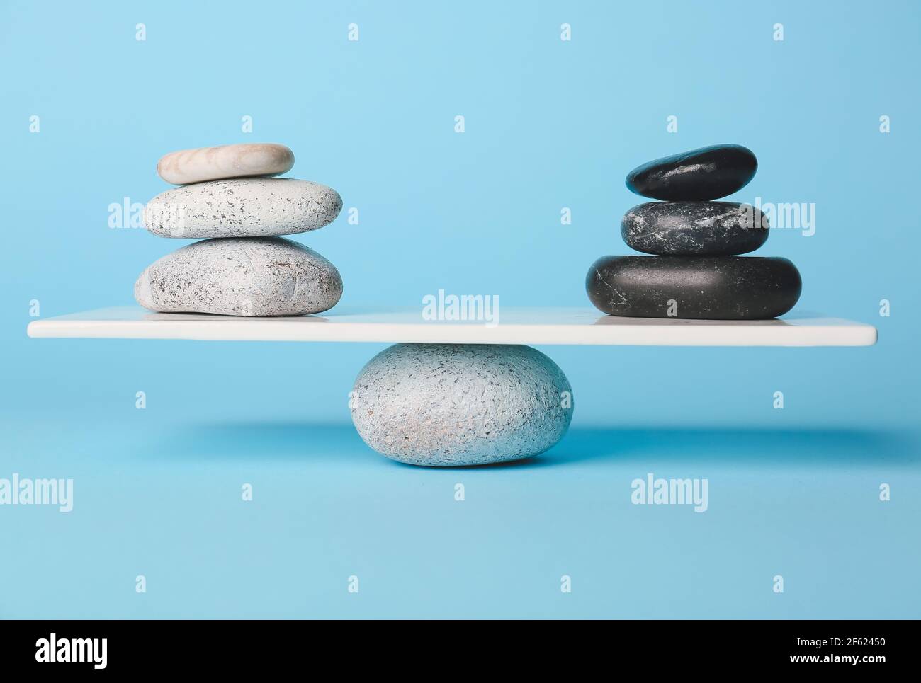 Positive negative scales hi-res stock photography and images - Alamy