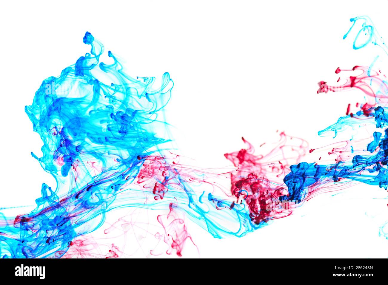 Abstract pattern falling into the water drop of red and blue ink Stock ...