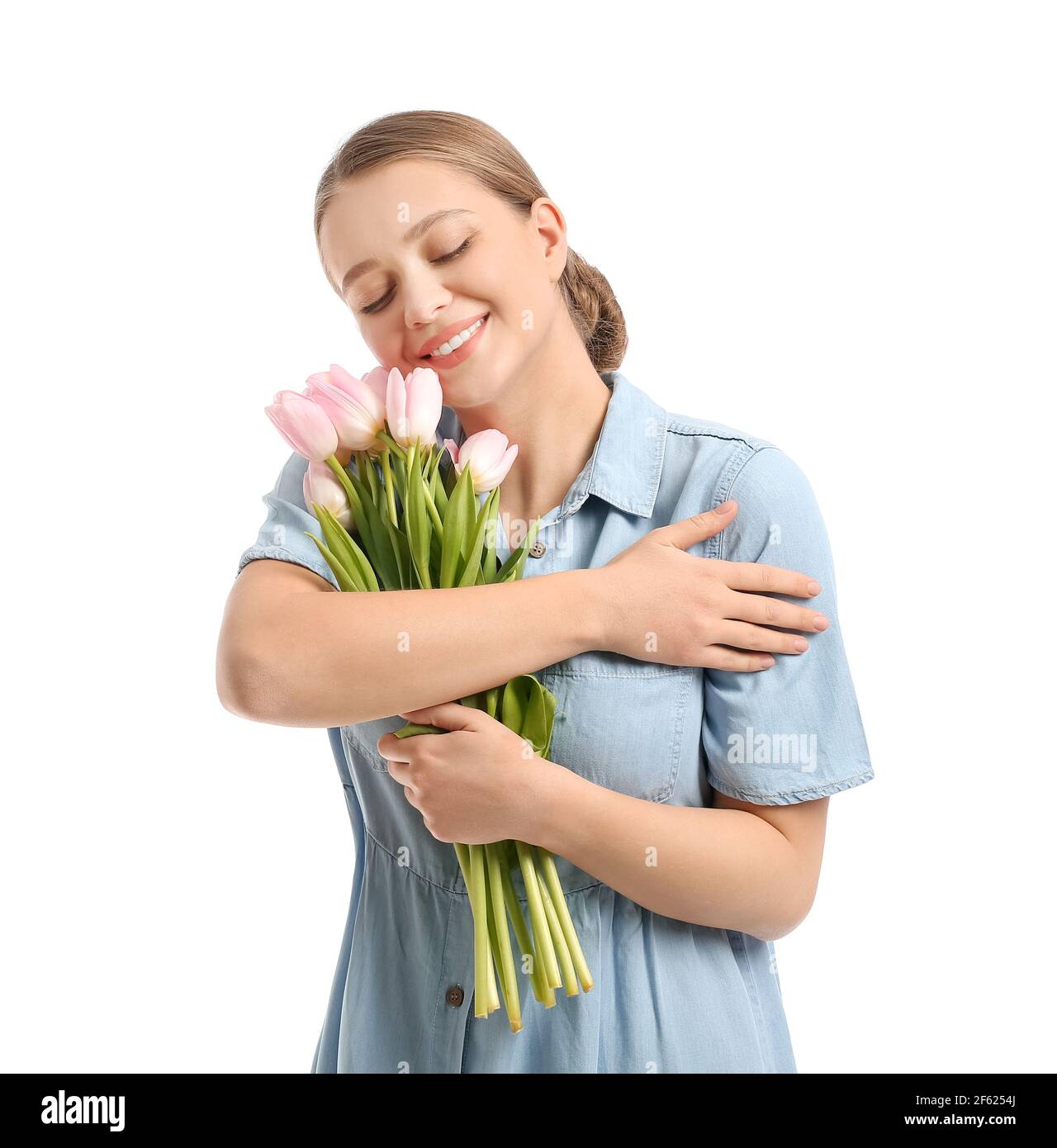 Happy woman hugging bouquet of flowers on white background Stock Photo ...