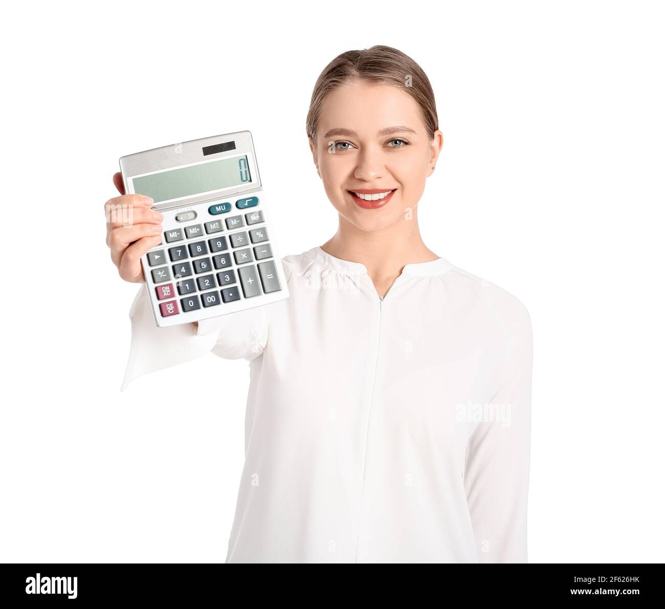 Young woman with calculator on white background Stock Photo - Alamy