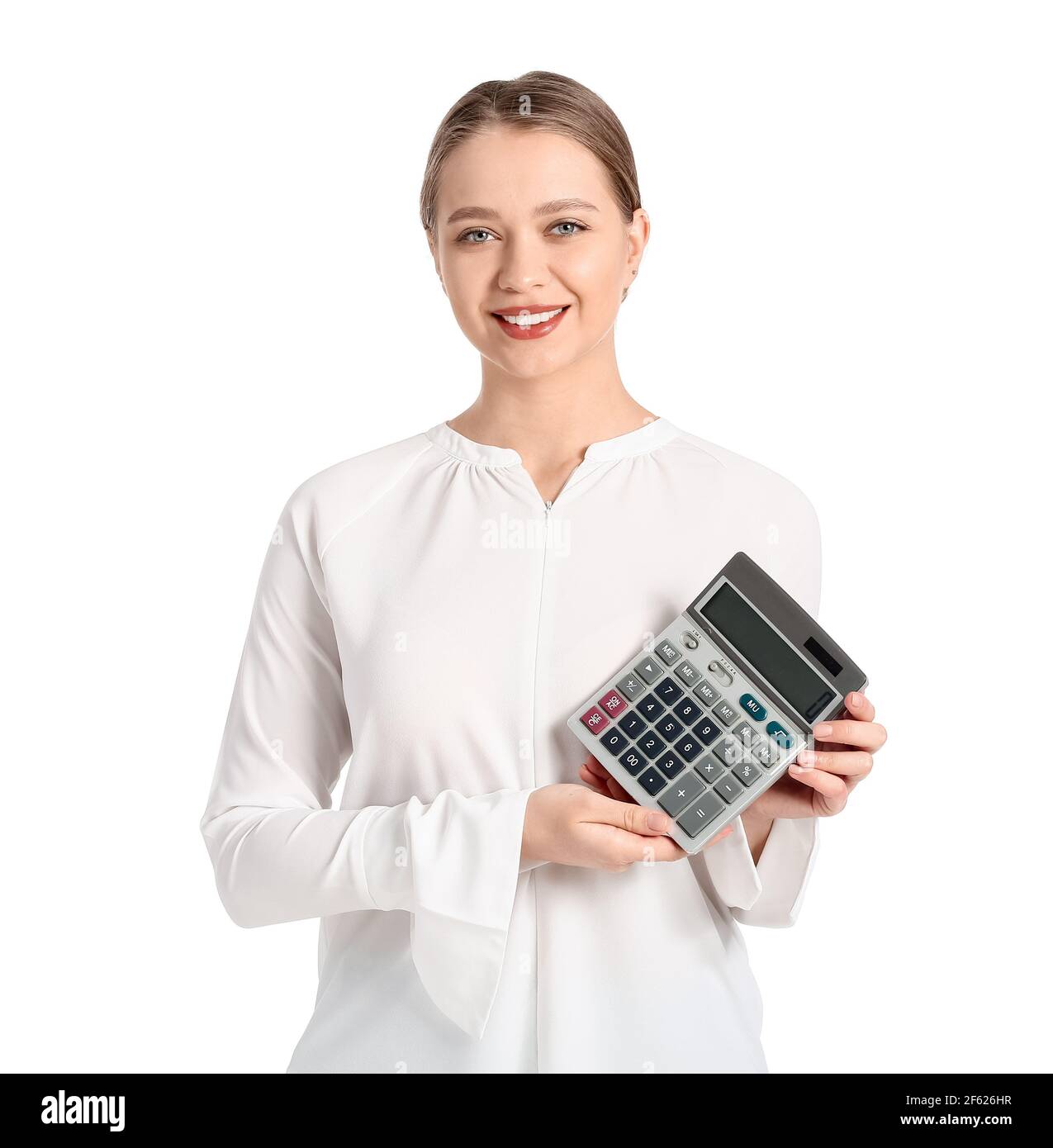 Young woman with calculator on white background Stock Photo - Alamy