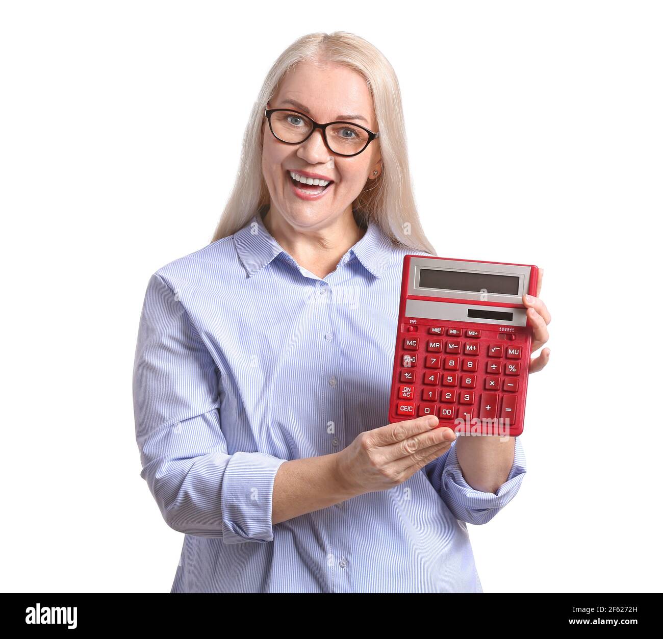 Mature woman with calculator on white background Stock Photo - Alamy
