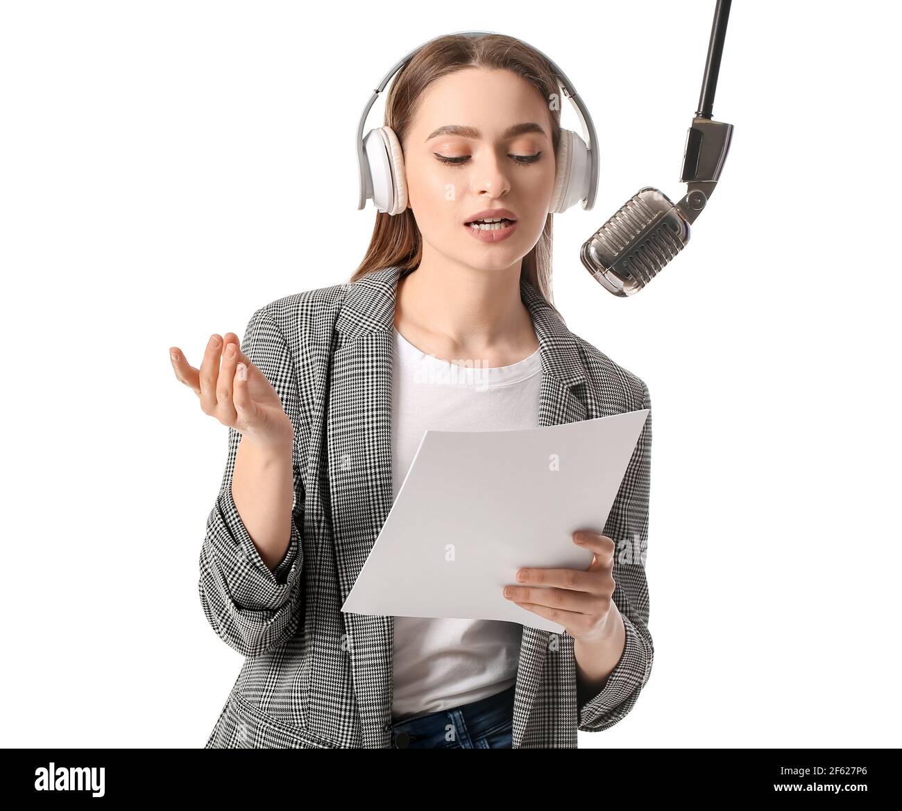 Female radio presenter with microphone on white background Stock Photo ...