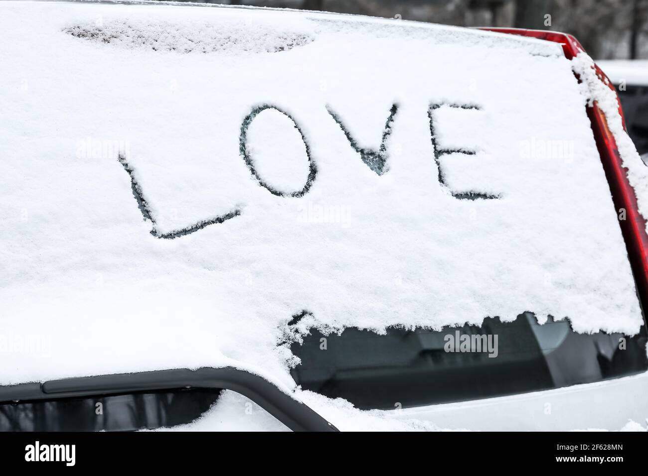 Love written on snow hi-res stock photography and images - Alamy