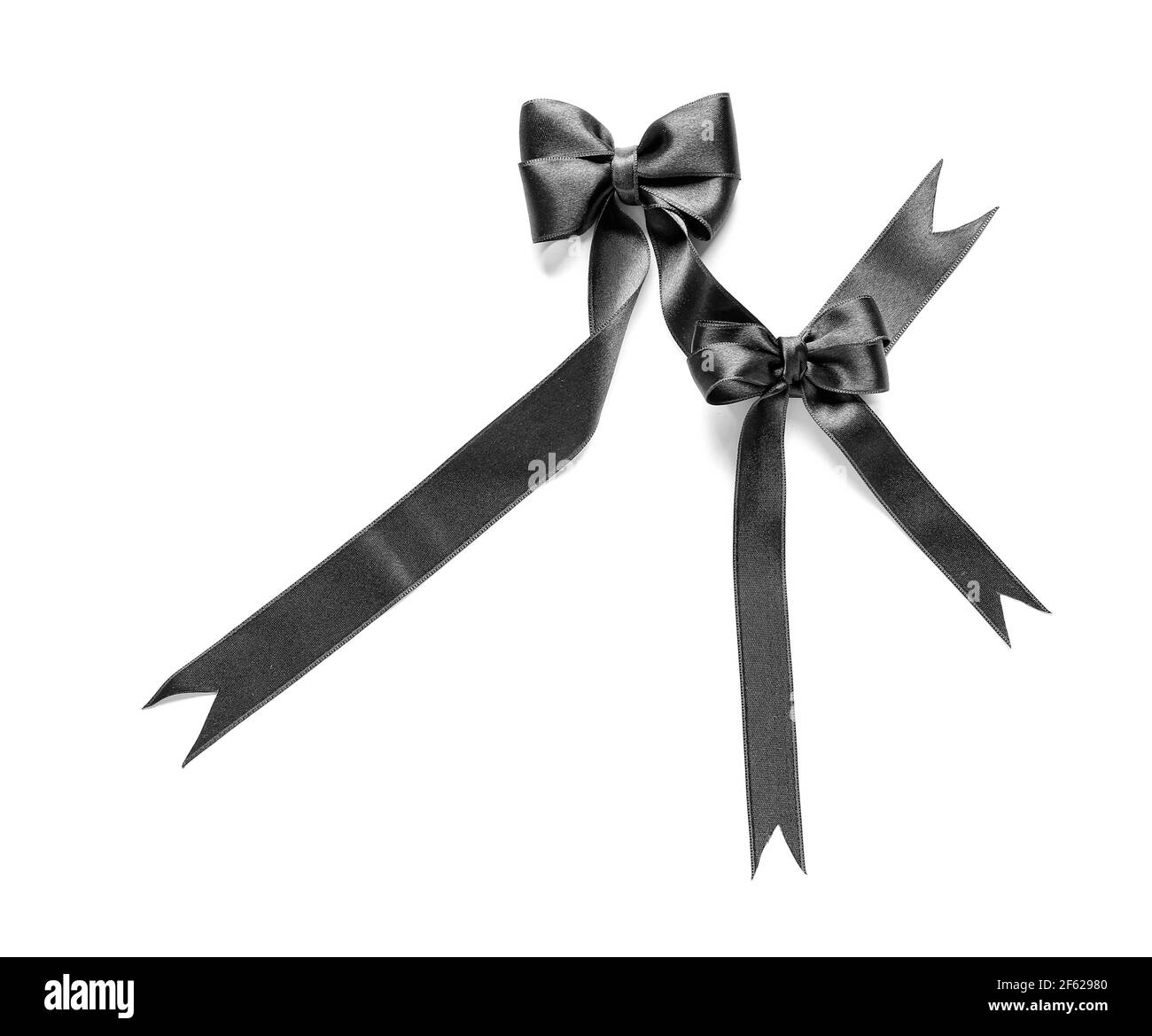 Black bows on white background Stock Photo - Alamy