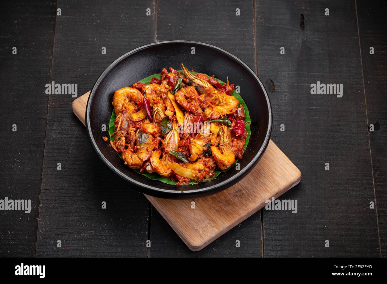 Kerala style Prawns roast or chemmeen varattiyathu made using red ...