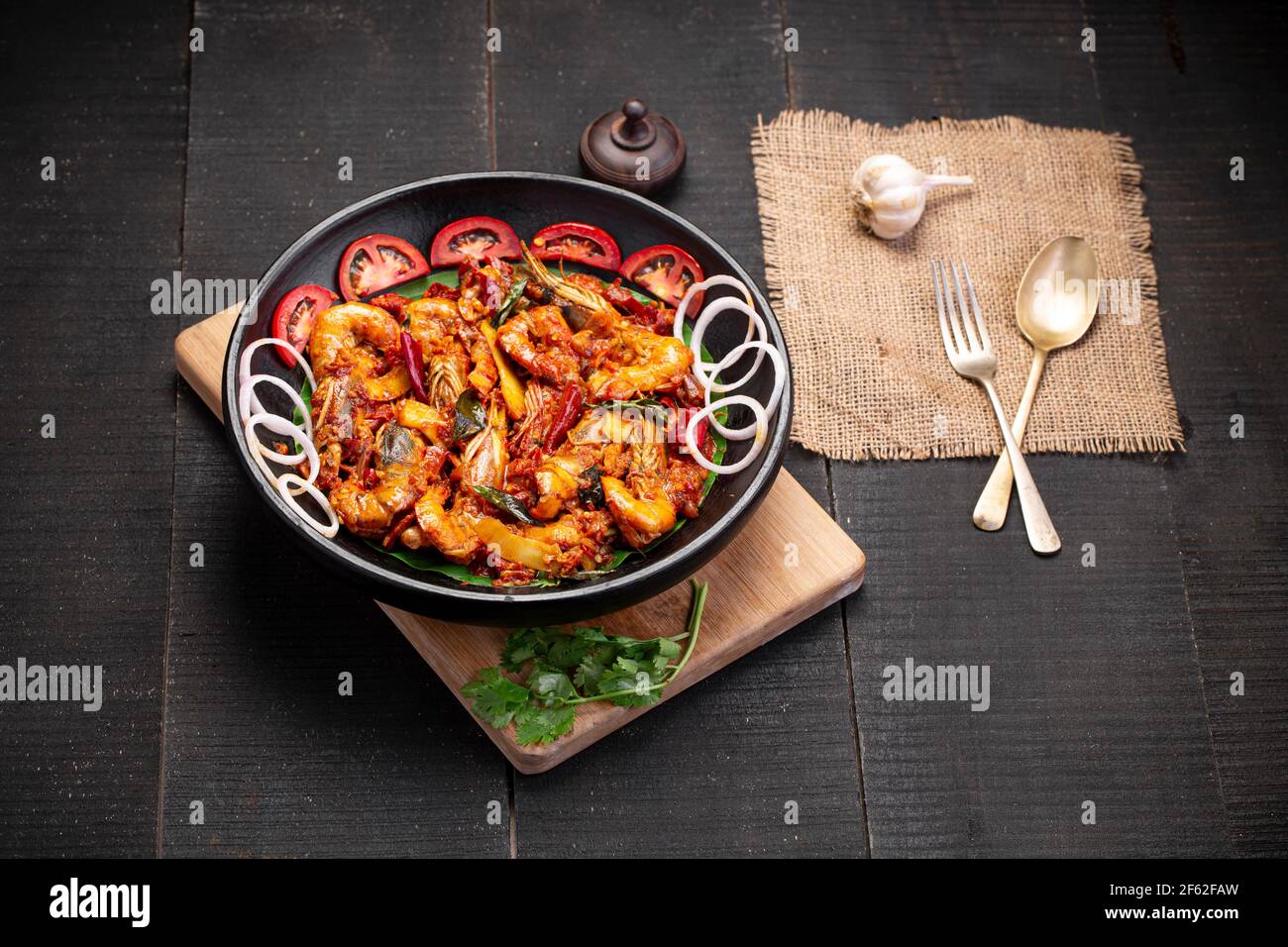 Kerala style Prawns roast or chemmeen varattiyathu made using red ...