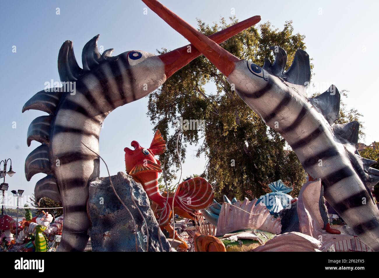 Whimsical animal and fish statues in waterfront area, Palaiokastritsa ...