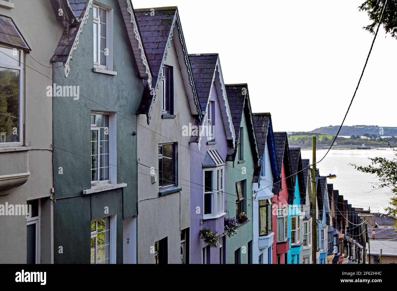 Typical colorful houses in the beautiful city of Cobh, Port of Cork ...