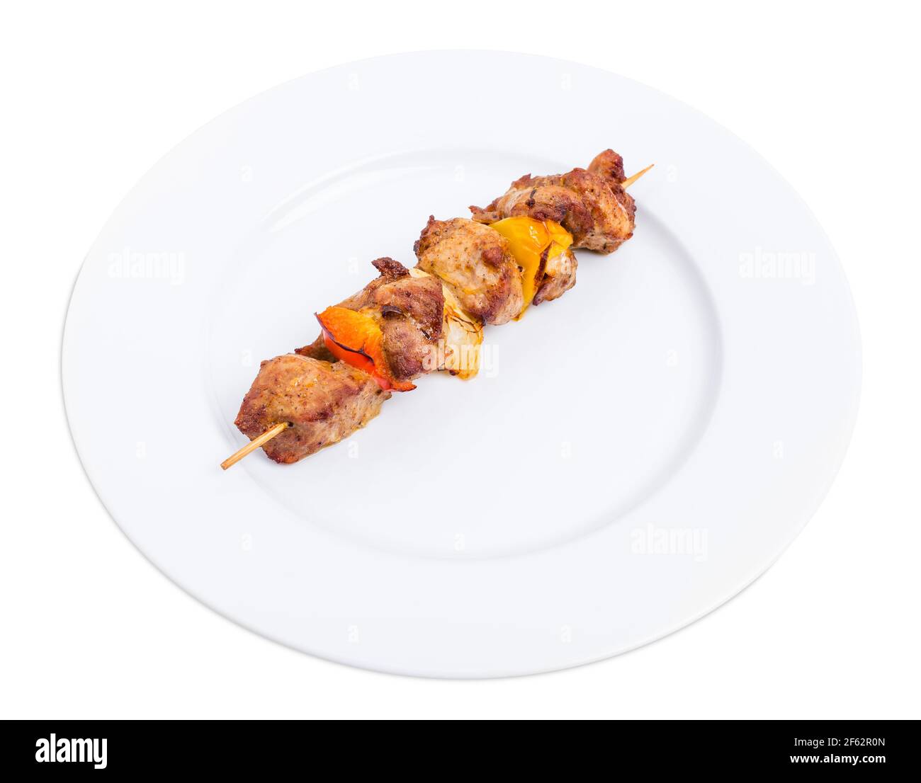 Grilled pork shish kebab with paprika and onions. Isolated on a white ...