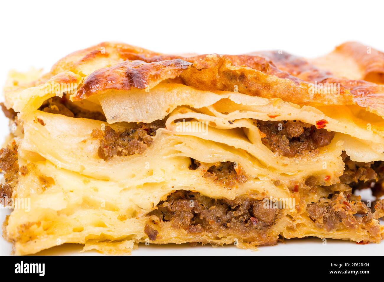 Baked pie with pork forcemeat. Macro. Photo can be used as a whole ...