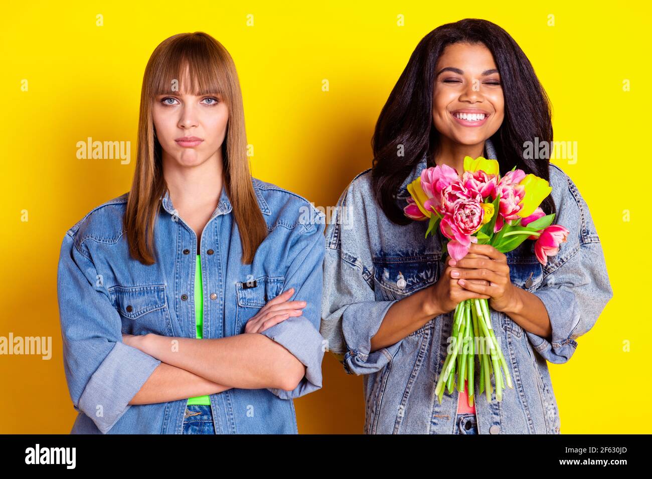 Photo of two different girls satisfied unsatisfied folded arms sullen ...