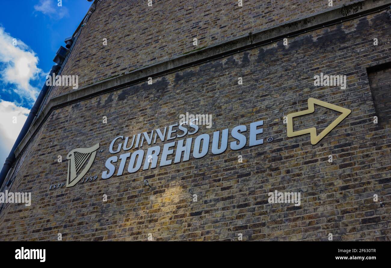 A picture of the Guinness Storehouse sign on display in a bricked ...