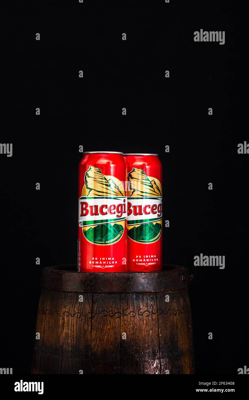 Can of Bucegi beer on beer barrel with dark background. Illustrative ...
