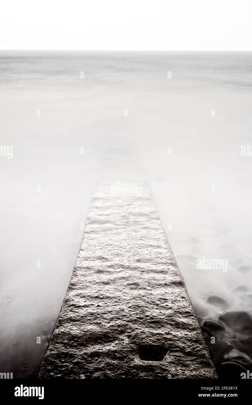 Stone jetty leading into the sea, Madeira Stock Photo - Alamy