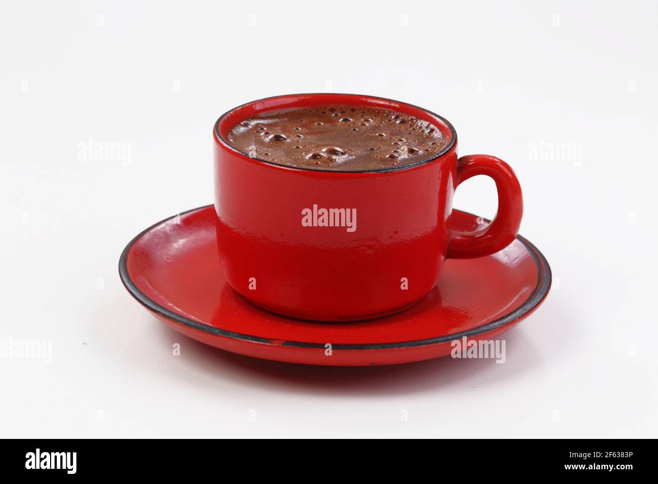 Coffee in a red mug on a white background Stock Photo - Alamy