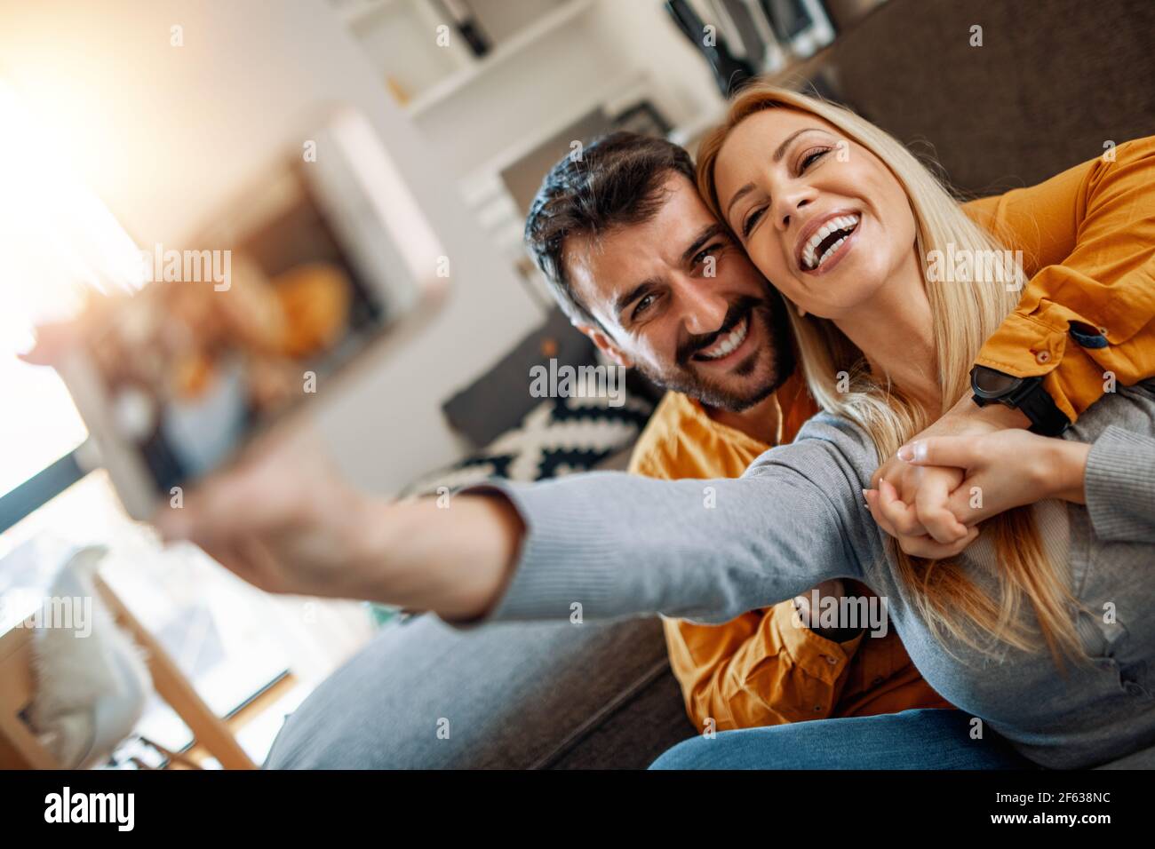 Couple stay home hugging hi-res stock photography and images - Alamy